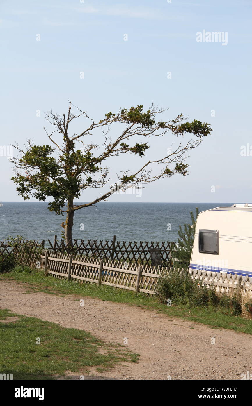 Caravan in the sunset Stock Photo - Alamy