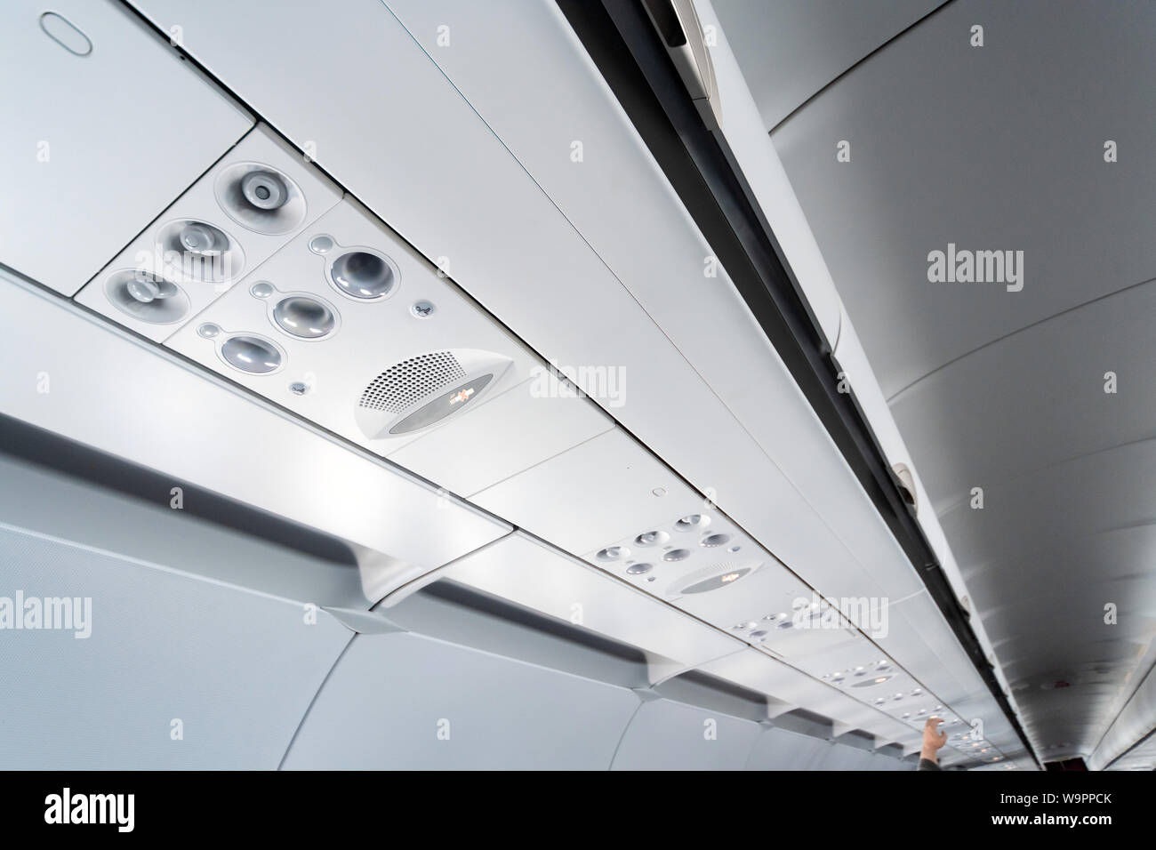 Airplane air conditioning control panel over seats. Stuffy air in ...