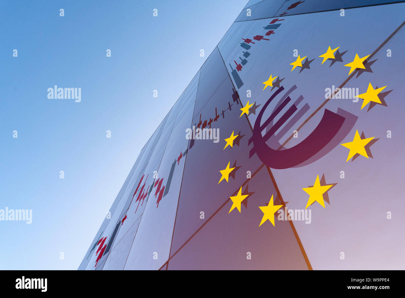 Euro symbol and marketplace charts on business center background ...