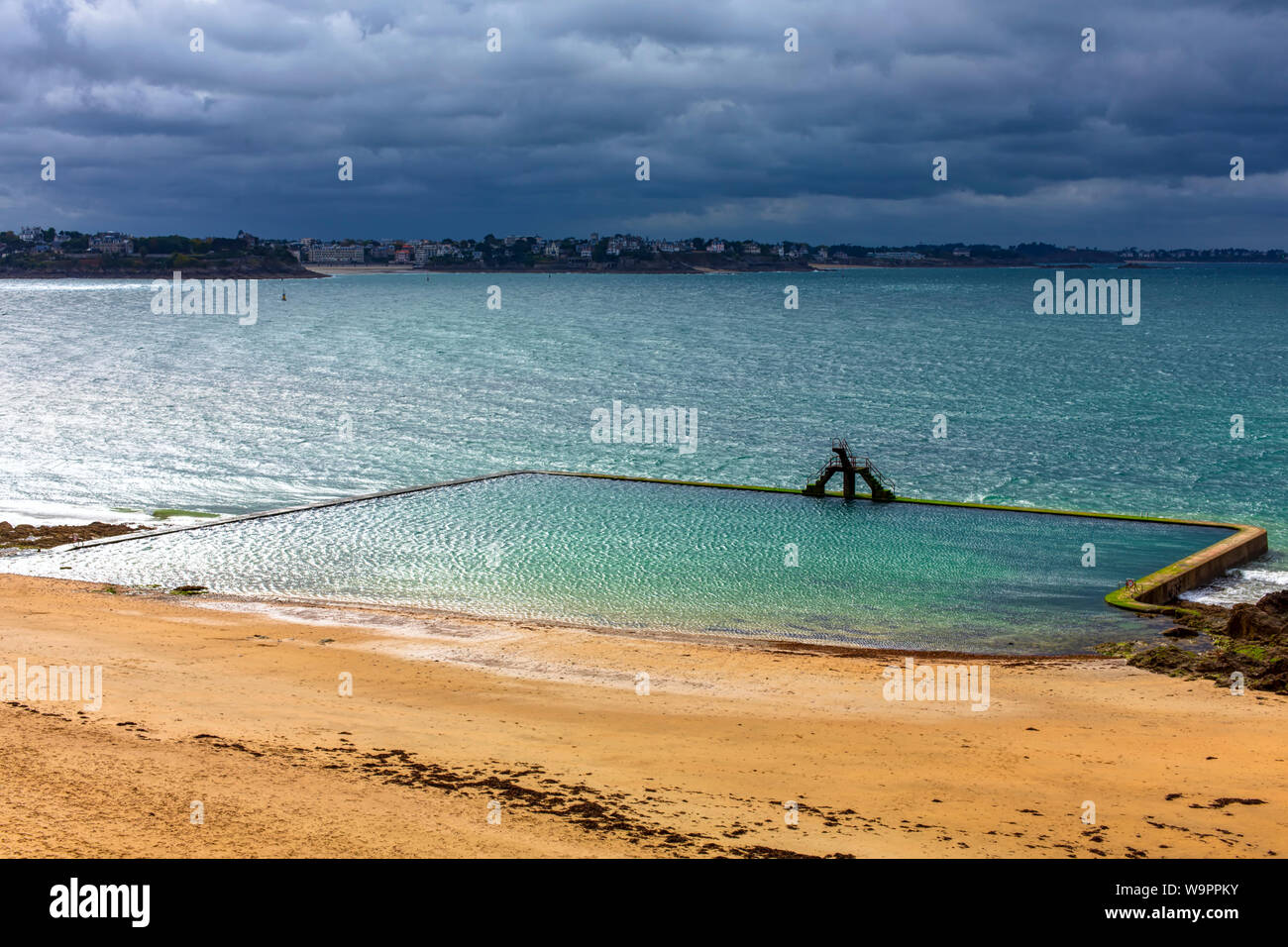 the sea pool of saint malo in france under a cloudy sky Stock Photo - Alamy