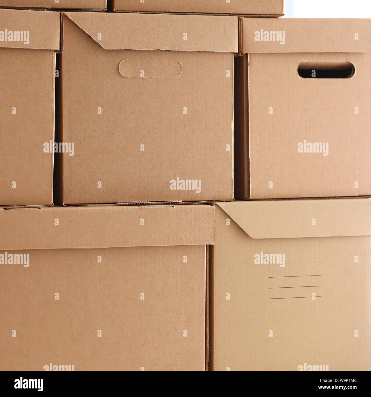 A lot of carton box of kraft color isolated on white background Stock ...