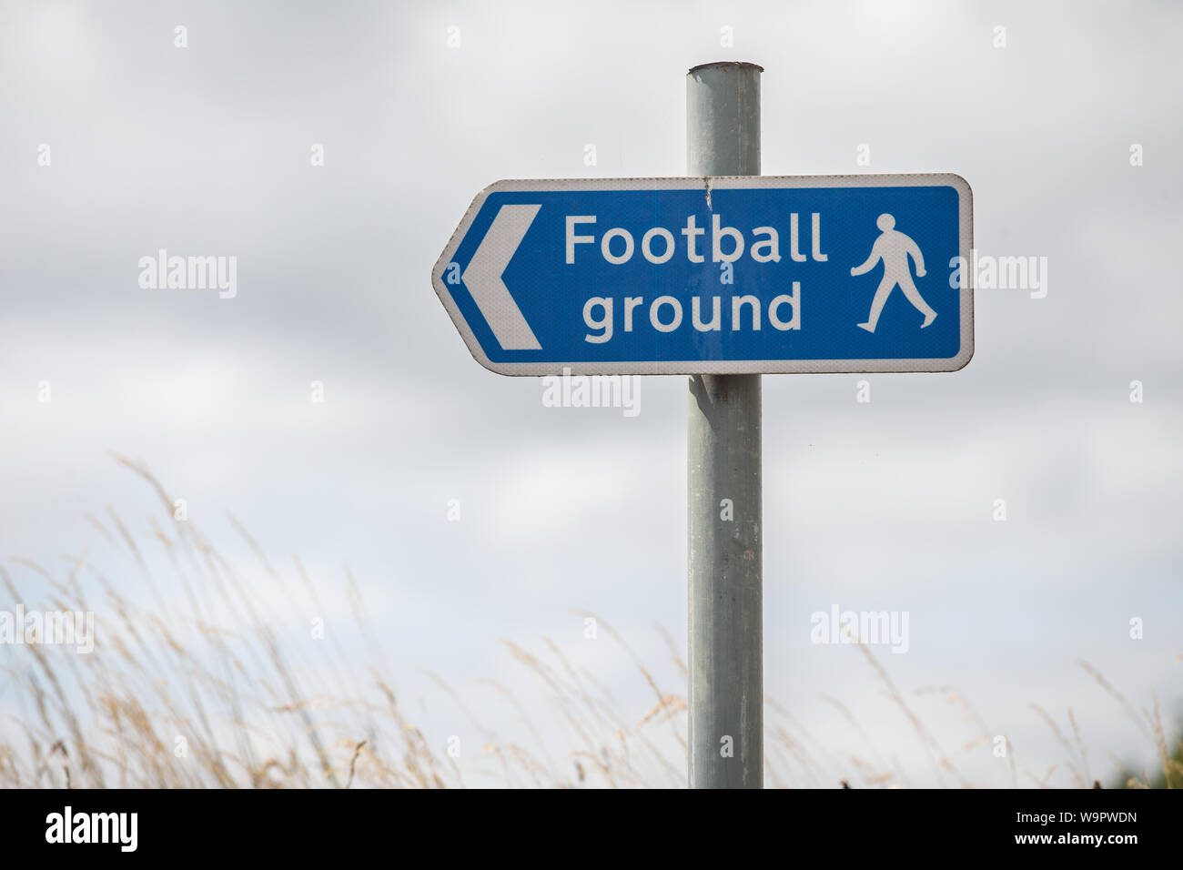 Pedestrian route sign. Blue background with white text signs. United ...