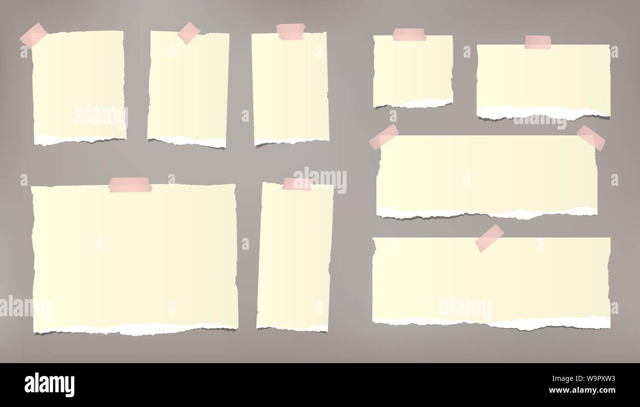 Set of torn yellow note, notebook paper pieces stuck with sticky tape ...