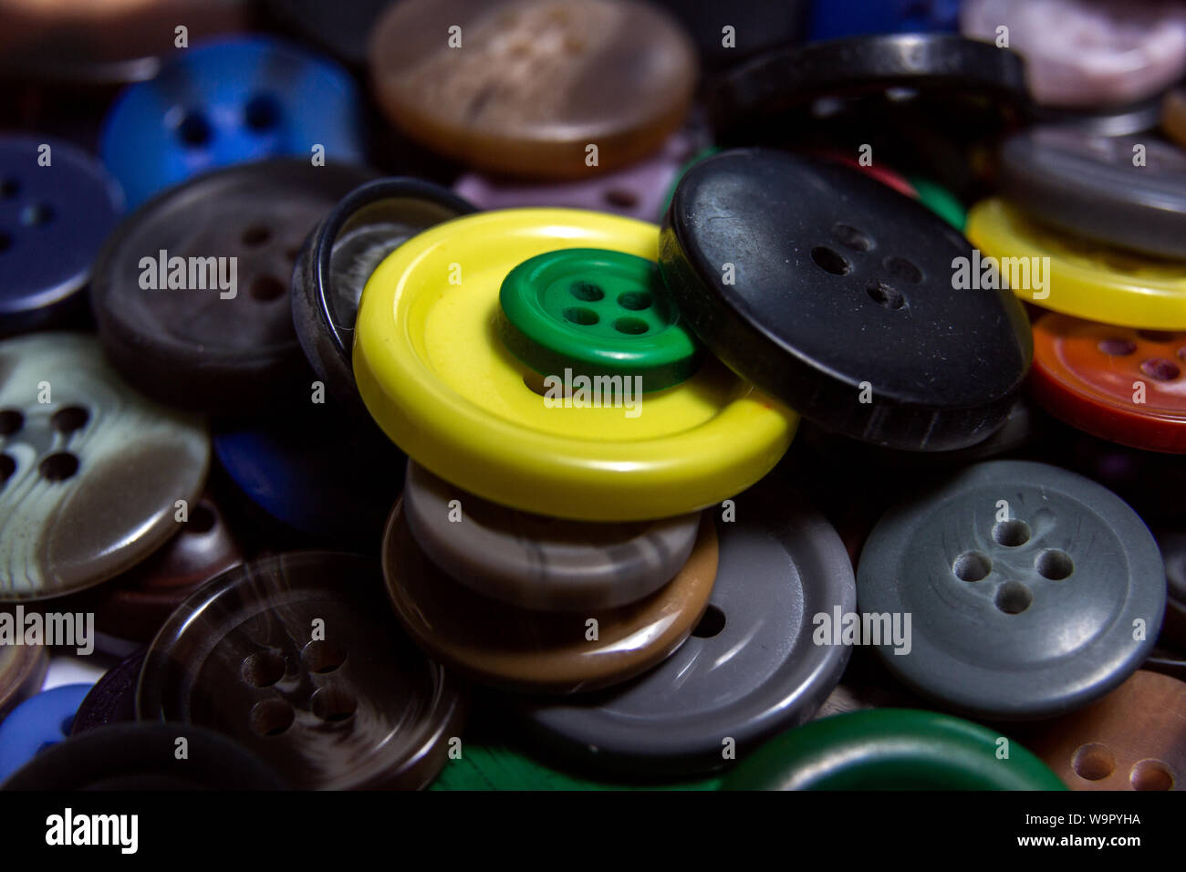 Background from multi-colored randomly scattered buttons Stock Photo ...
