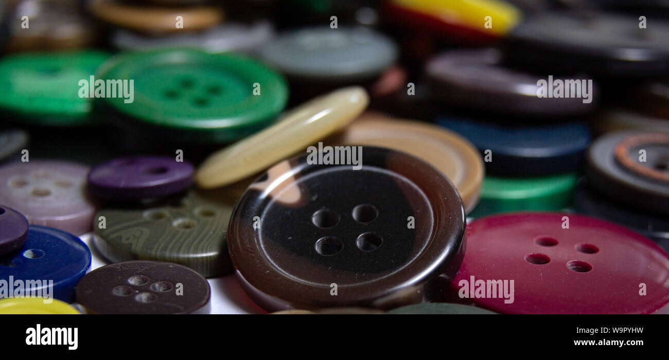 Background from multi-colored randomly scattered buttons Stock Photo ...