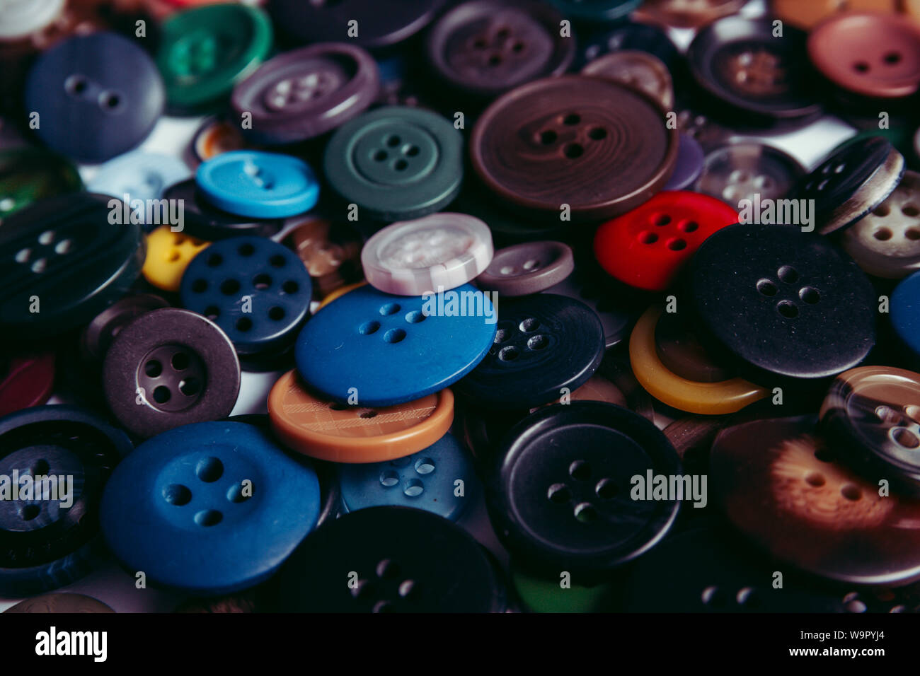 Background from multi-colored randomly scattered buttons Stock Photo ...