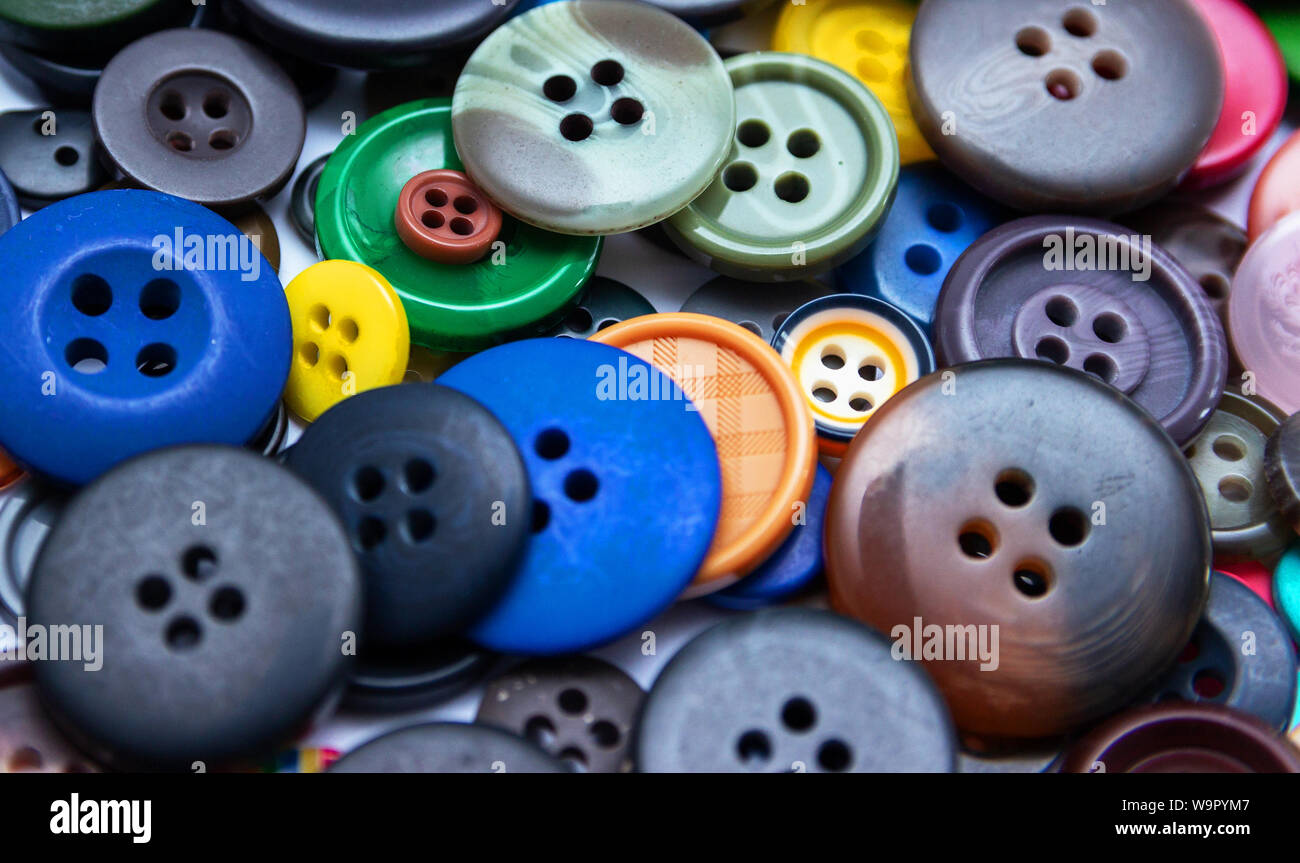 Background from multi-colored randomly scattered buttons Stock Photo ...