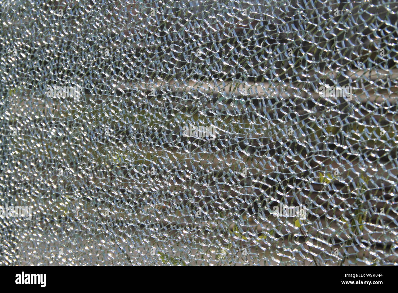 a fragmented car window made of safety glass Stock Photo - Alamy