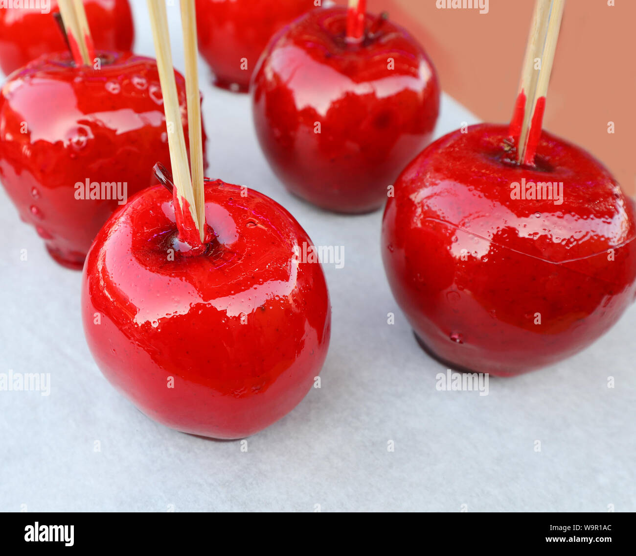 red caramelized apple is a special Italian street food for sale in the ...