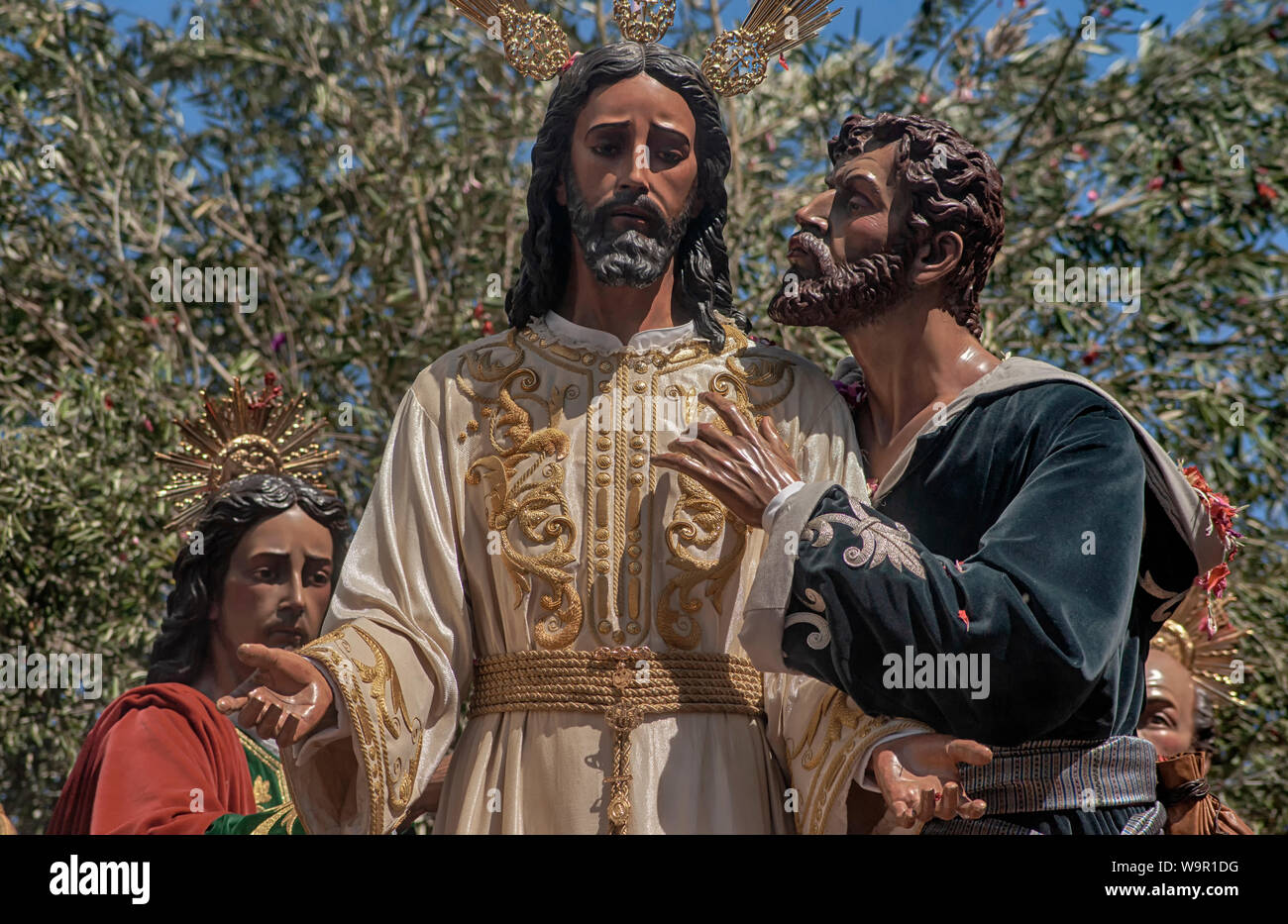 Brotherhood of the kiss of Judas, Holy Week in Seville Stock Photo - Alamy