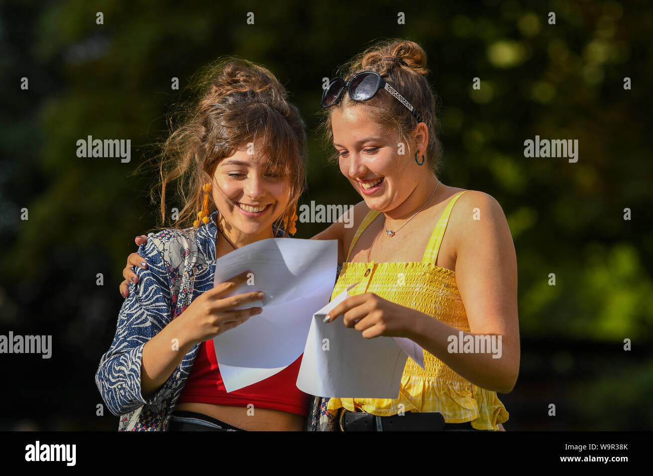 Sophie Todd (right) and Willow Major celebrate after collecting their A ...