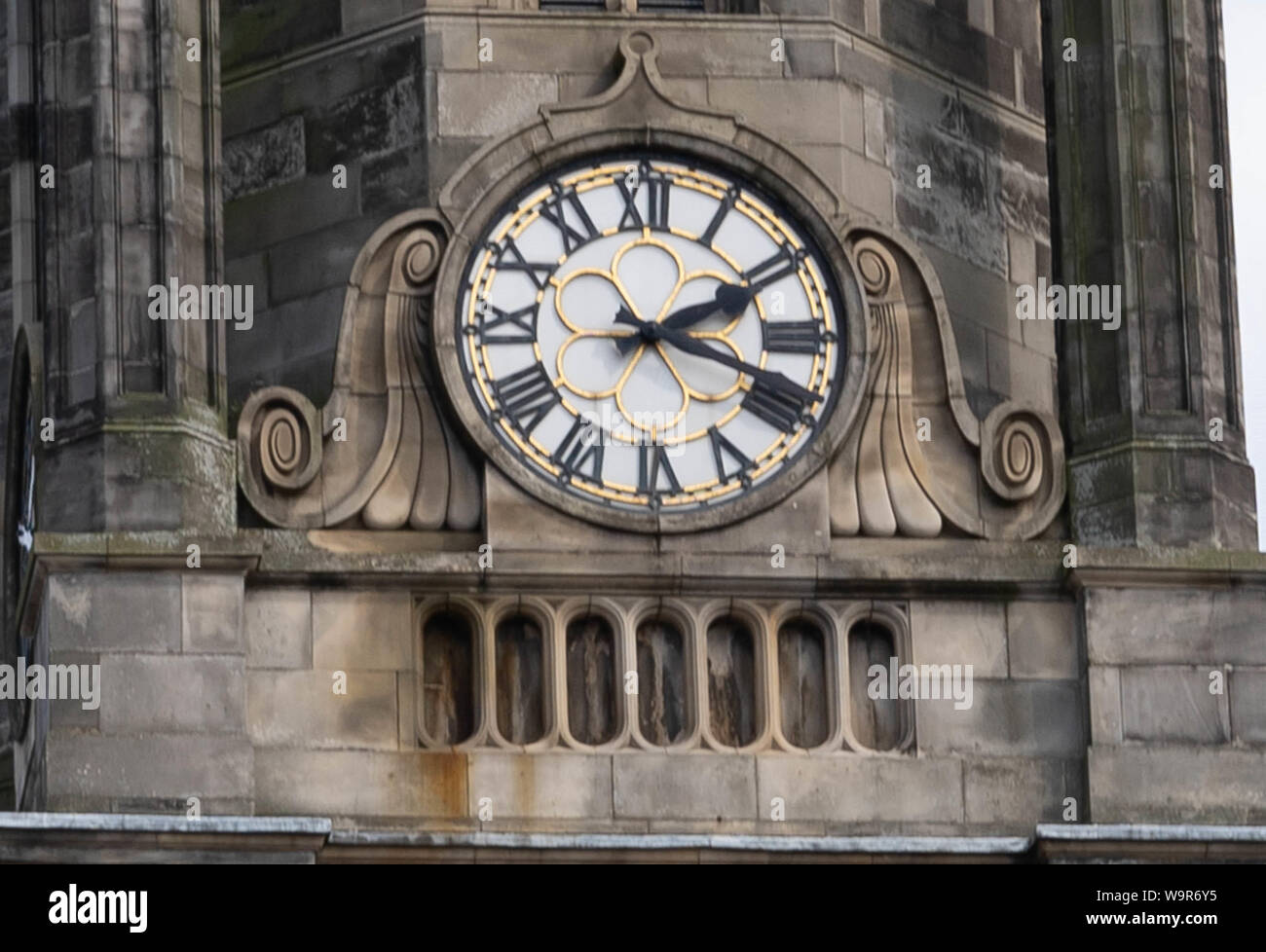 edinburgh old town clock face on a church Stock Photo - Alamy
