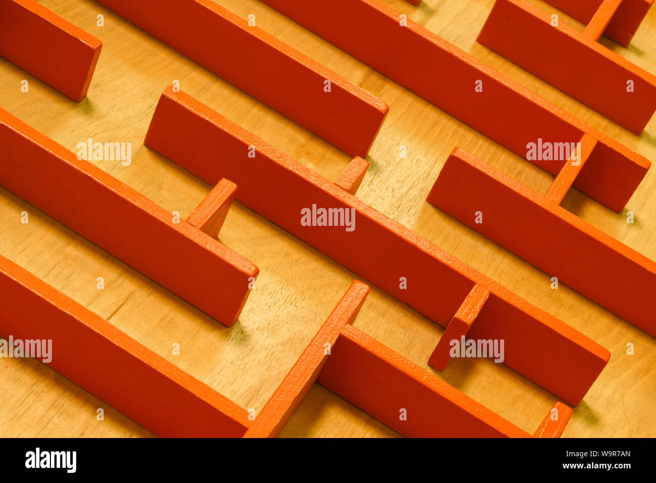 background - a top view of a maze of wooden partitions on a plywood ...