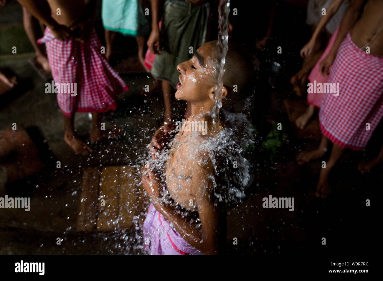 Kathmandu, Nepal. 15th Aug, 2019. Young Nepali Hindu priest takes holy ...