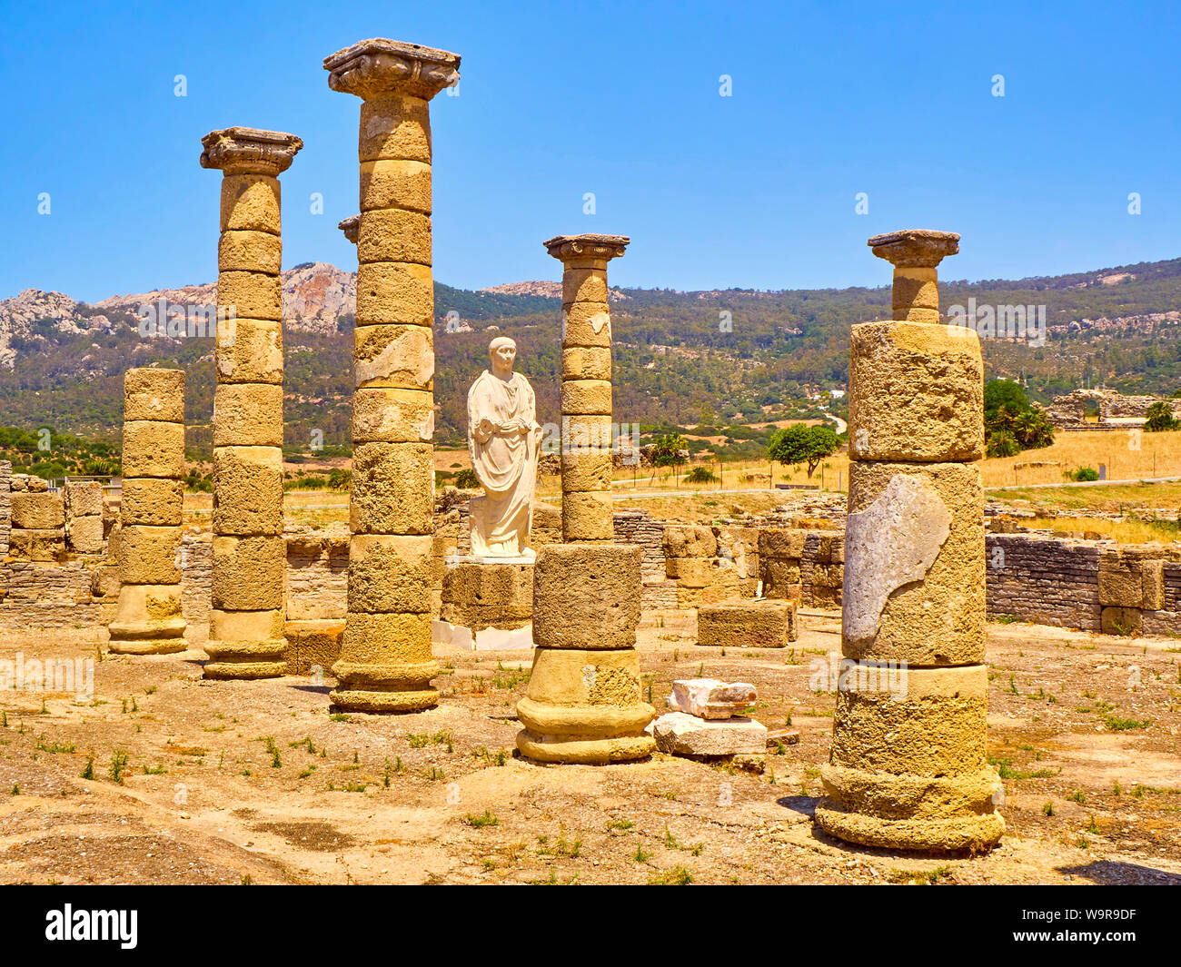 Remains of the main Basilica and the statue of the Roman Emperor Trajan ...