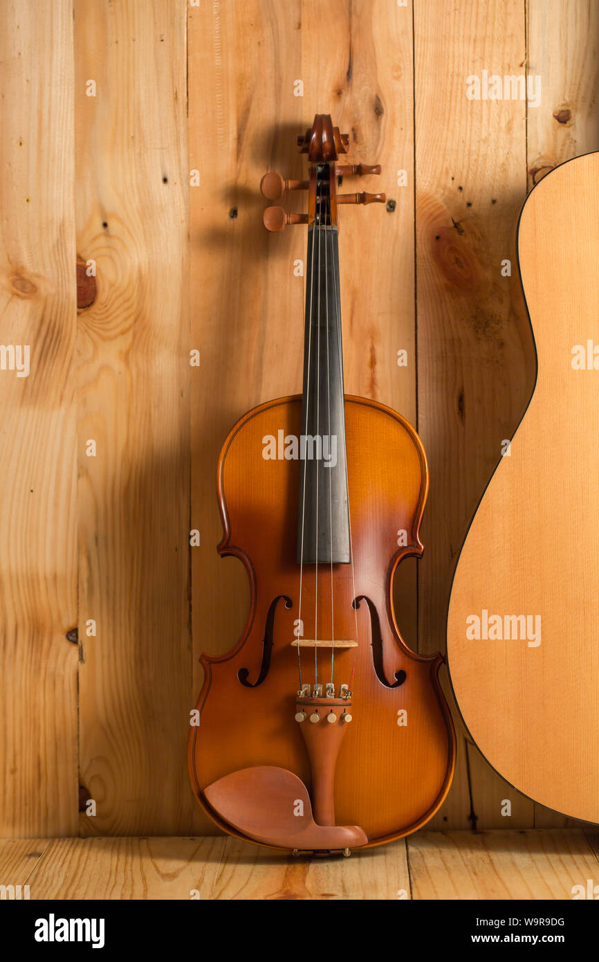 violin and guitar on wood. background,still life Stock Photo - Alamy