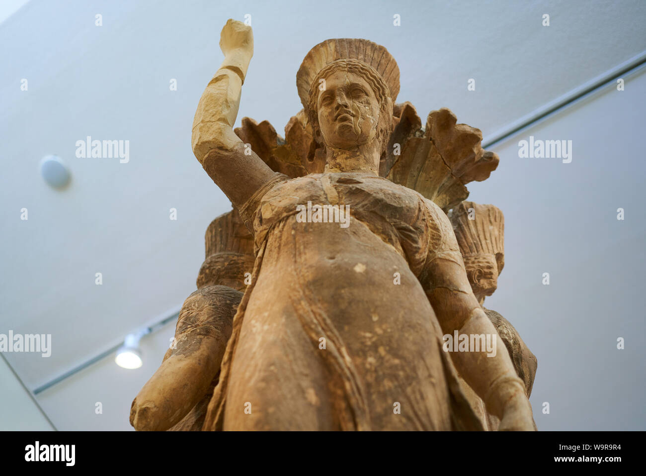 Statues of dancers that stood atop a tall column at Delphi on display ...