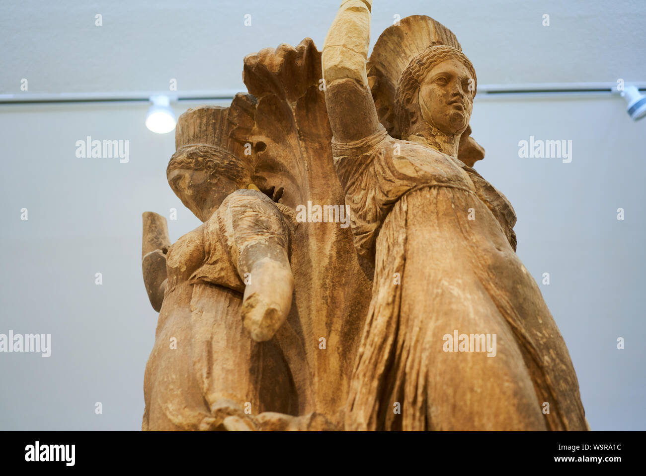 Statues of dancers that stood atop a tall column at Delphi on display ...