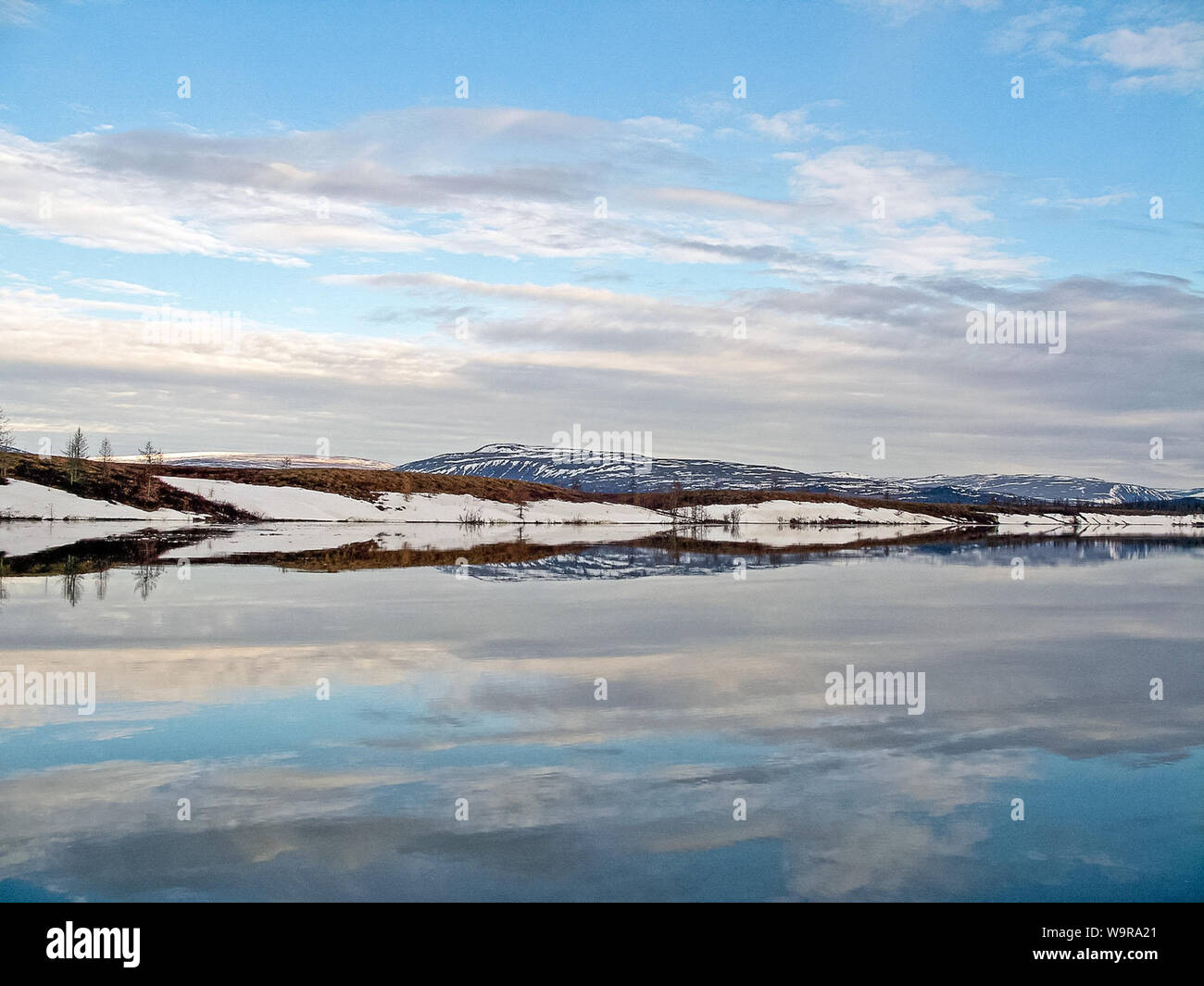 River landscape Early spring. bare trees, melting snow Stock Photo - Alamy