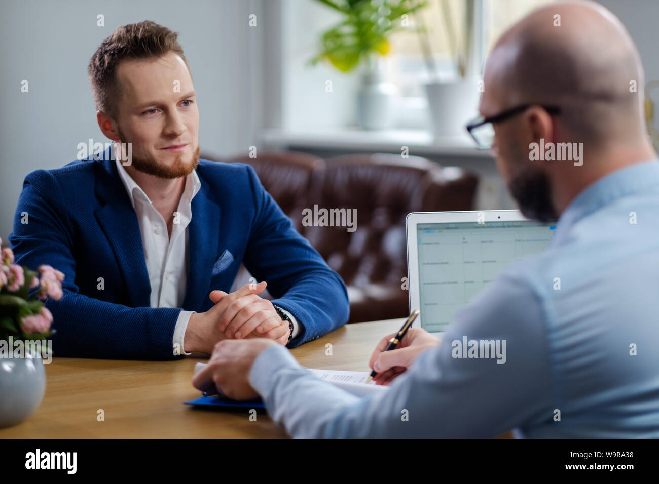 Confident man attending job interview Stock Photo - Alamy