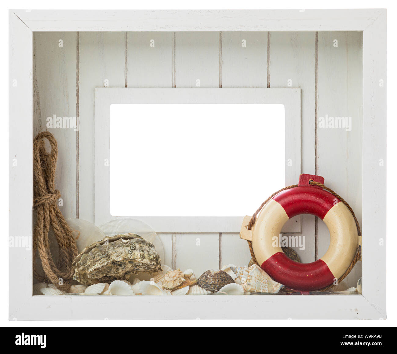 Wooden white picture frame with maritime decoration like sea shells ...