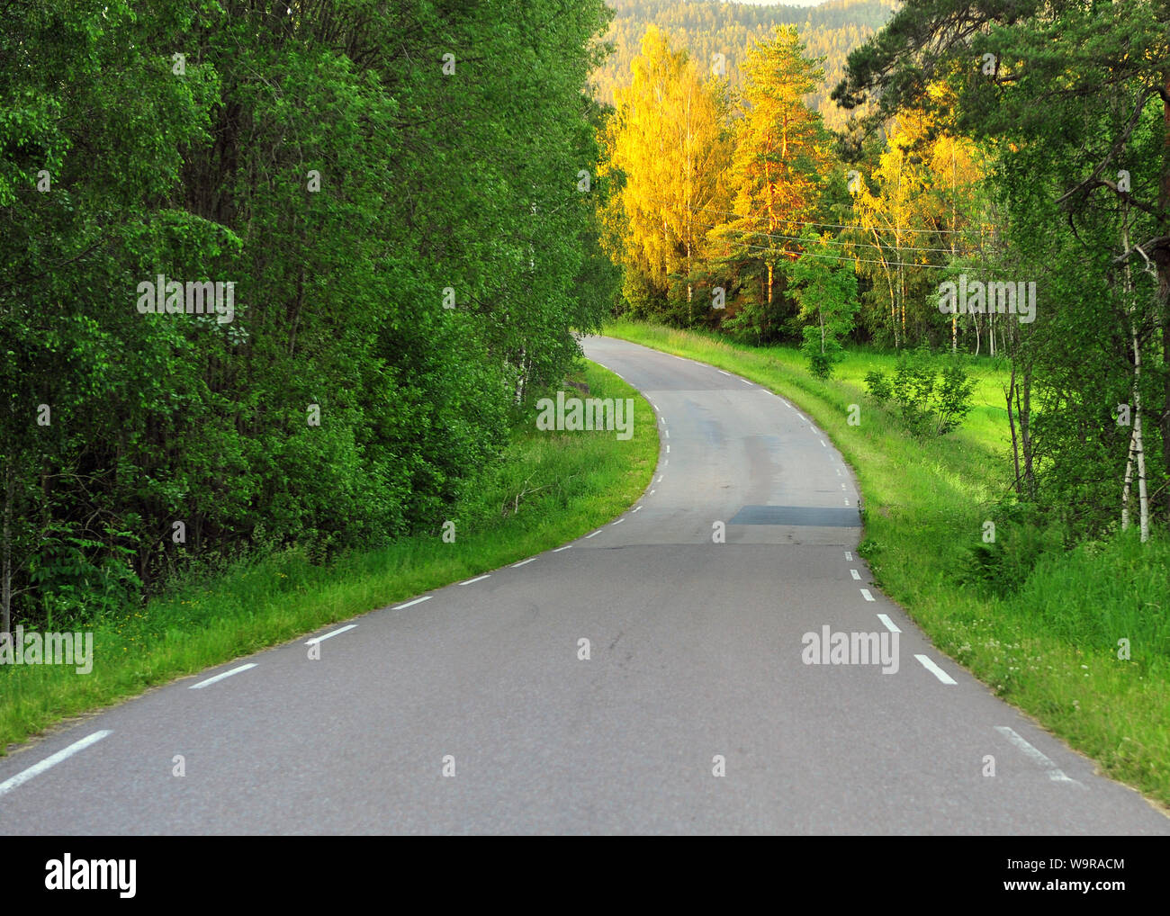 Winding asphalt road hi-res stock photography and images - Alamy