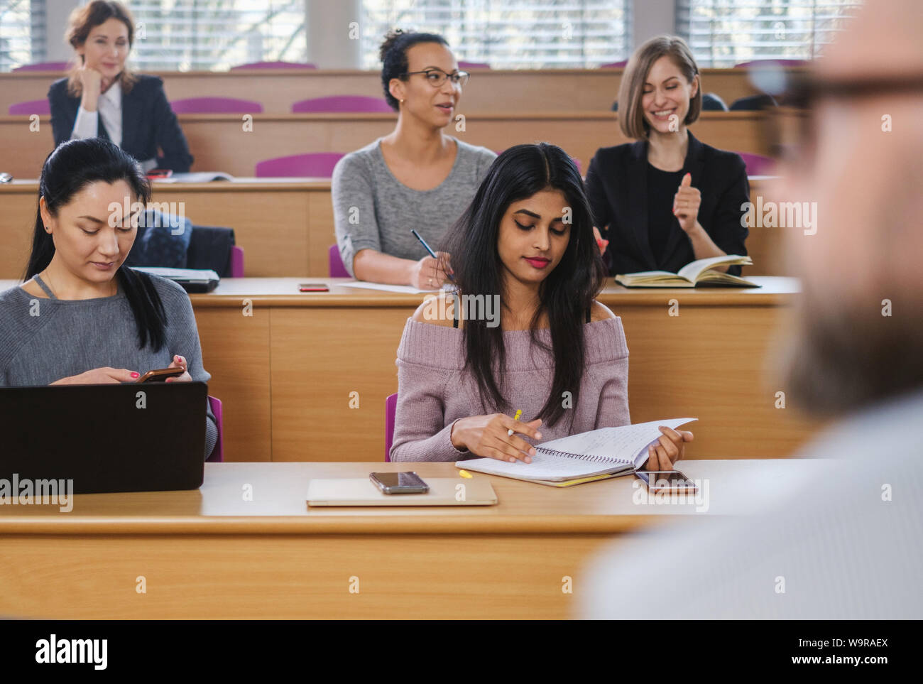 Multinational students in auditorium hi-res stock photography and ...