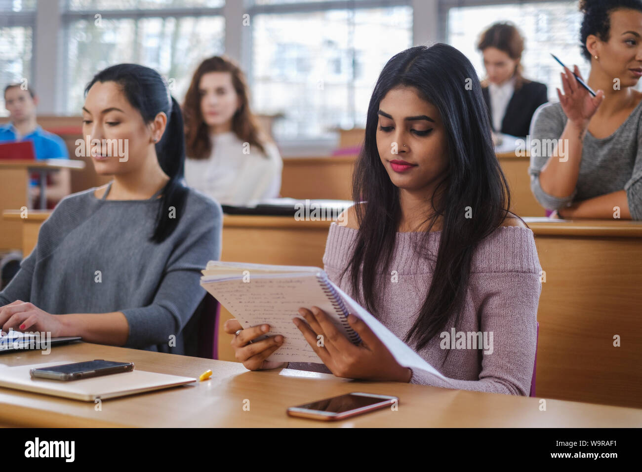 Multinational group of students in an auditorium Stock Photo - Alamy