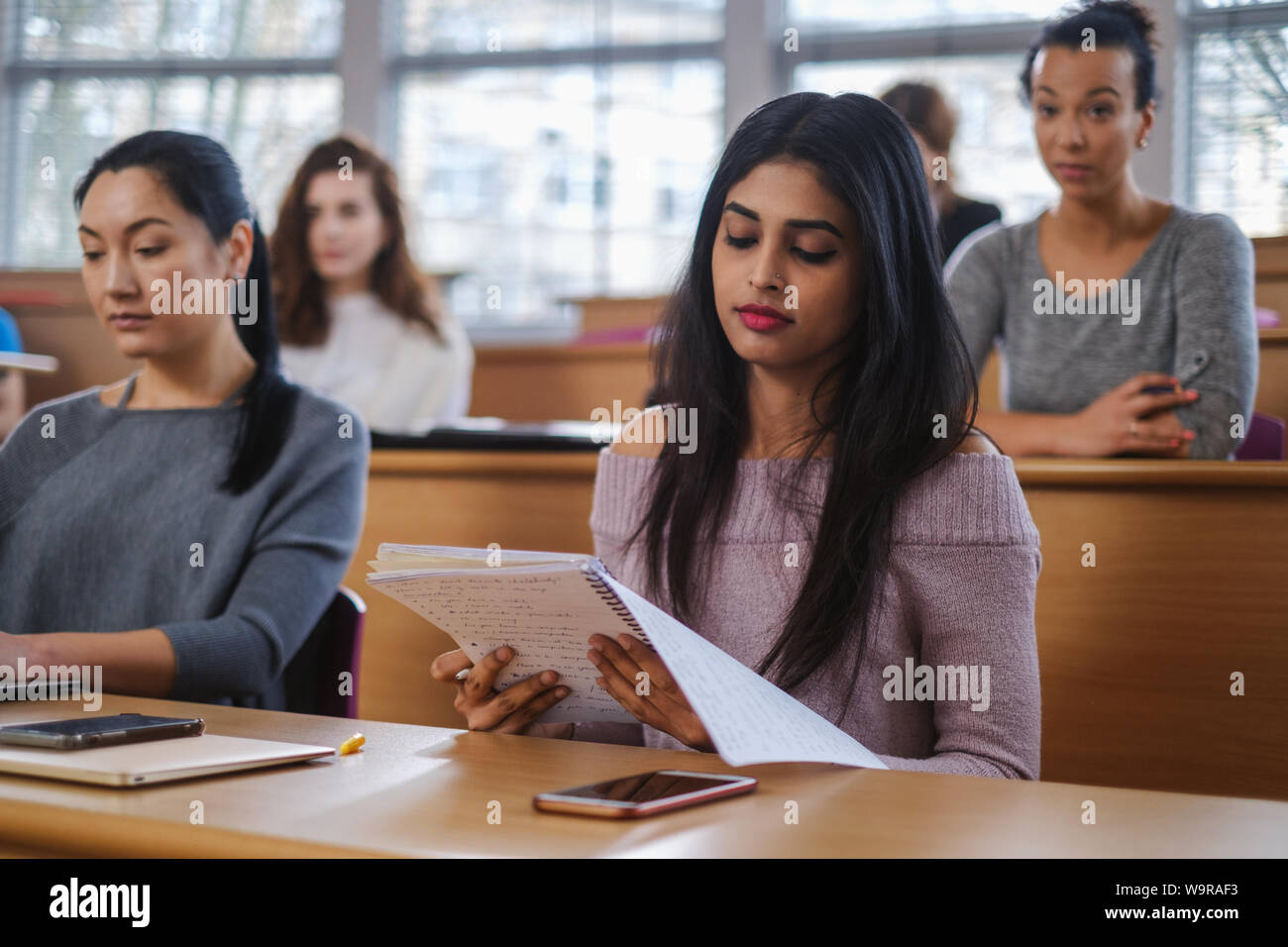 Multinational group of students in an auditorium Stock Photo - Alamy