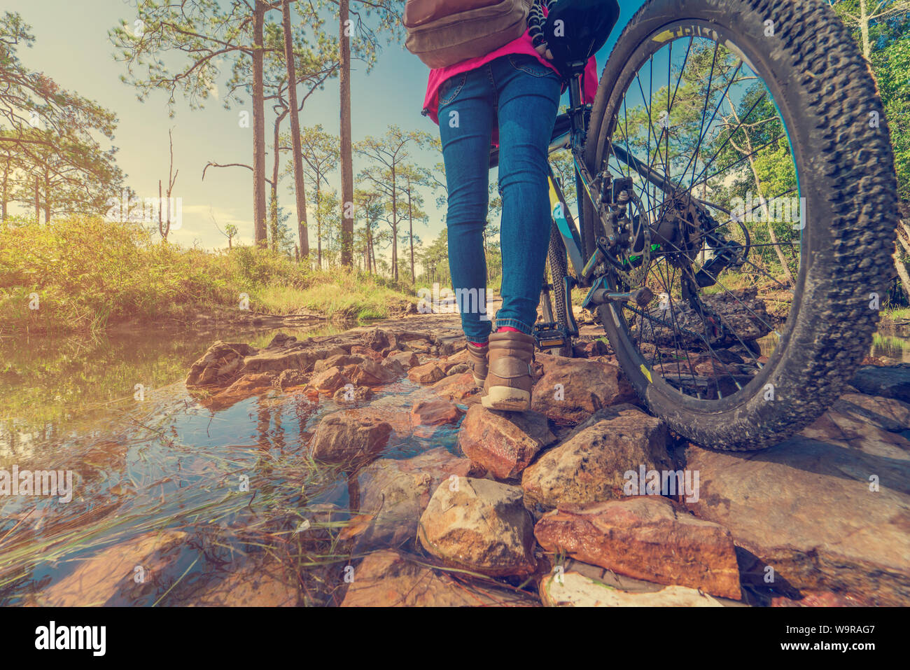 Young woman bicyclist in helmet hi-res stock photography and images - Alamy