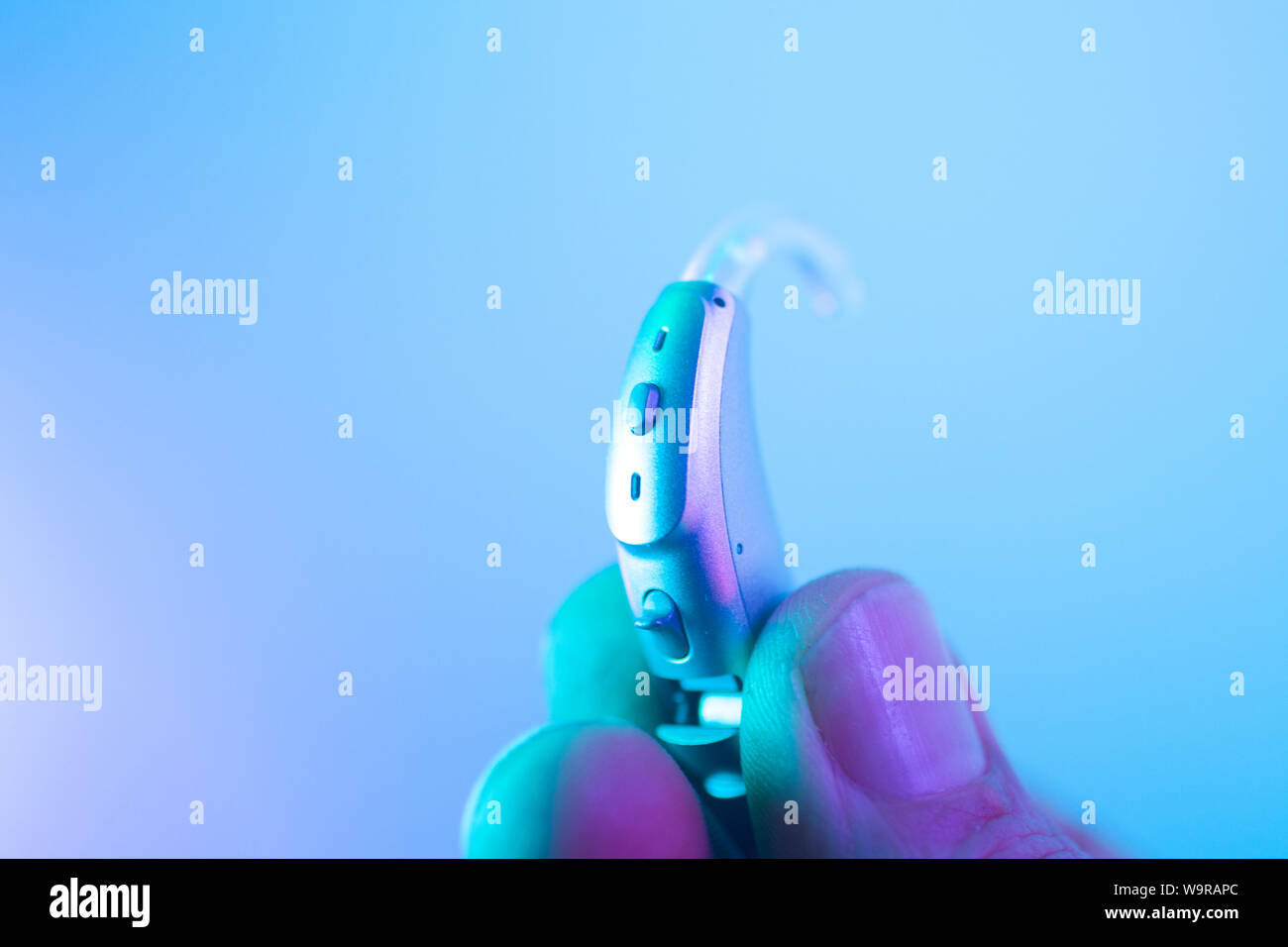 Modern digital hearing aid for deafness and deaf people Stock Photo - Alamy