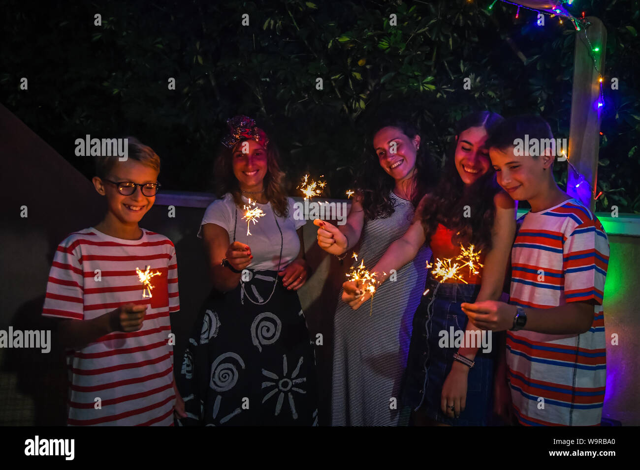 Hand holding firework stick hi-res stock photography and images - Alamy