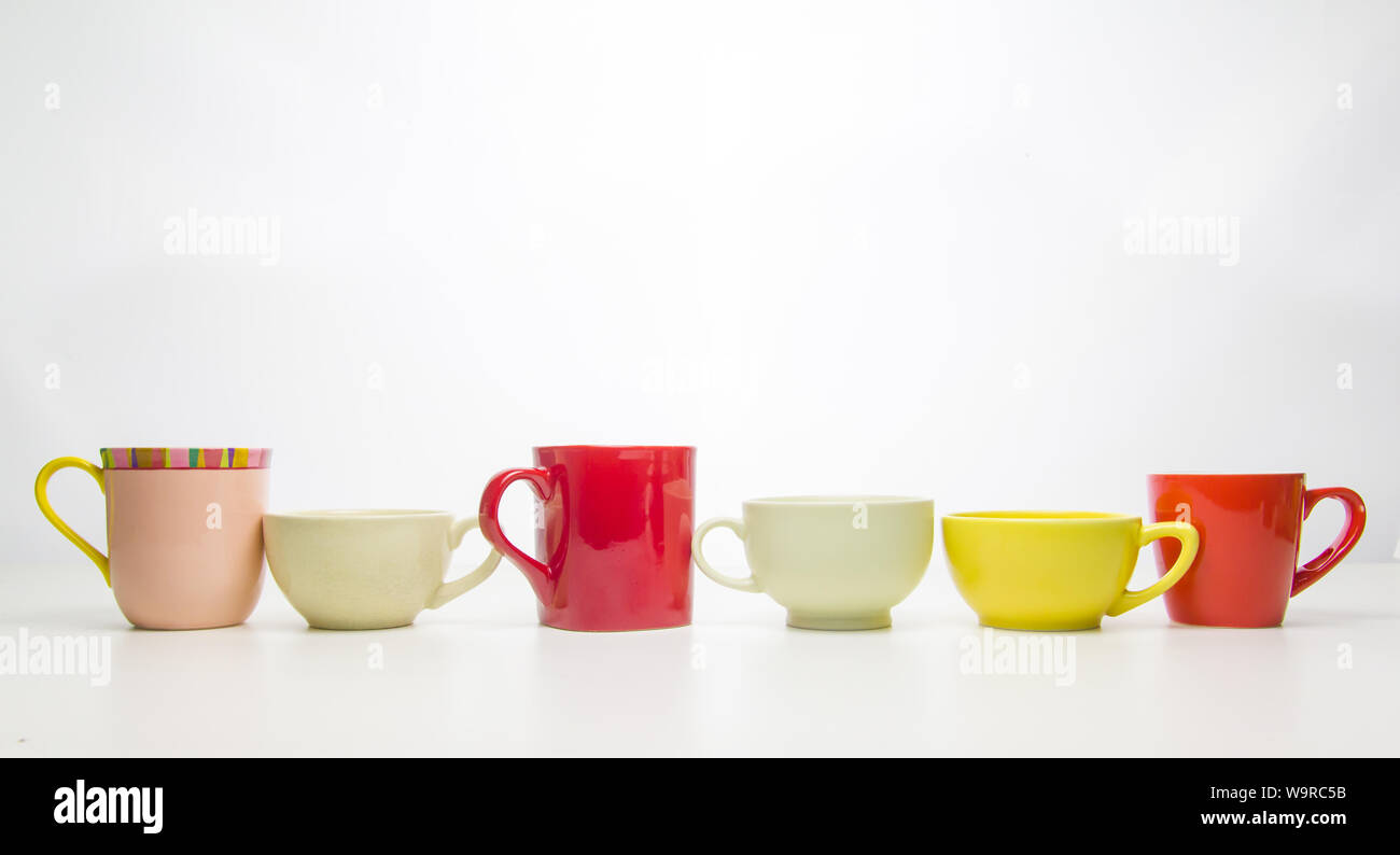 colorful cups of coffee on whitebackground Stock Photo - Alamy