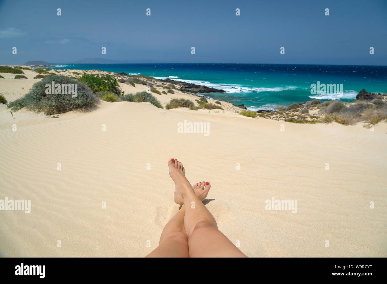 Woman Legs Beach Lying High Resolution Stock Photography and Images - Alamy