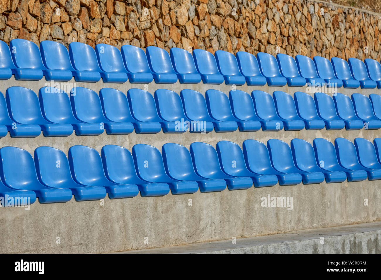 Blue Chairs At The Stadium Stock Photo - Alamy
