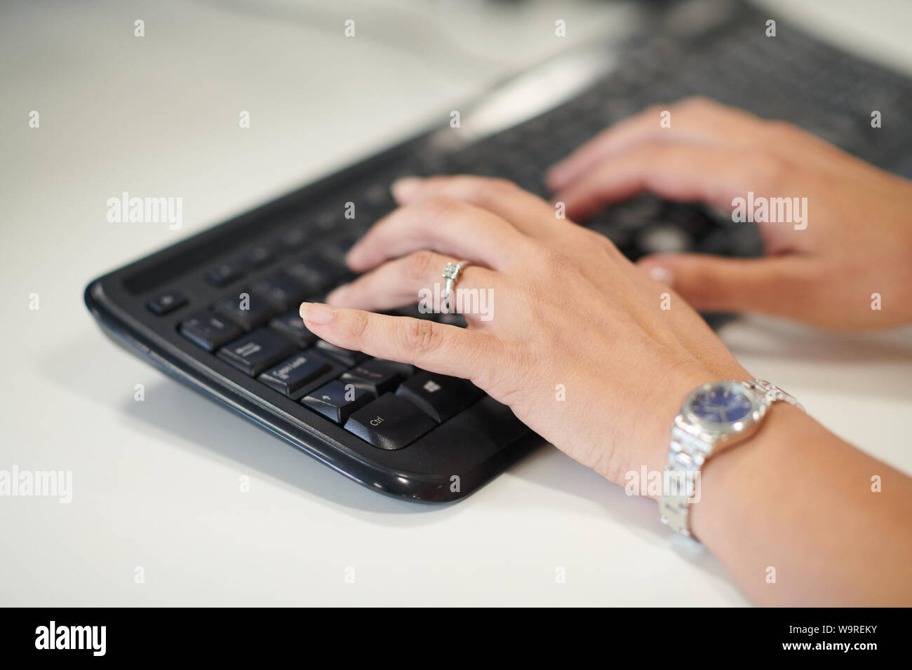 At the office working Stock Photo - Alamy