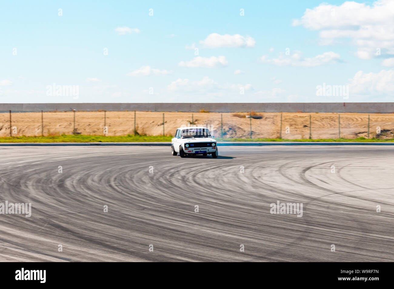 The guy on the car Lada white trains to drift Stock Photo - Alamy