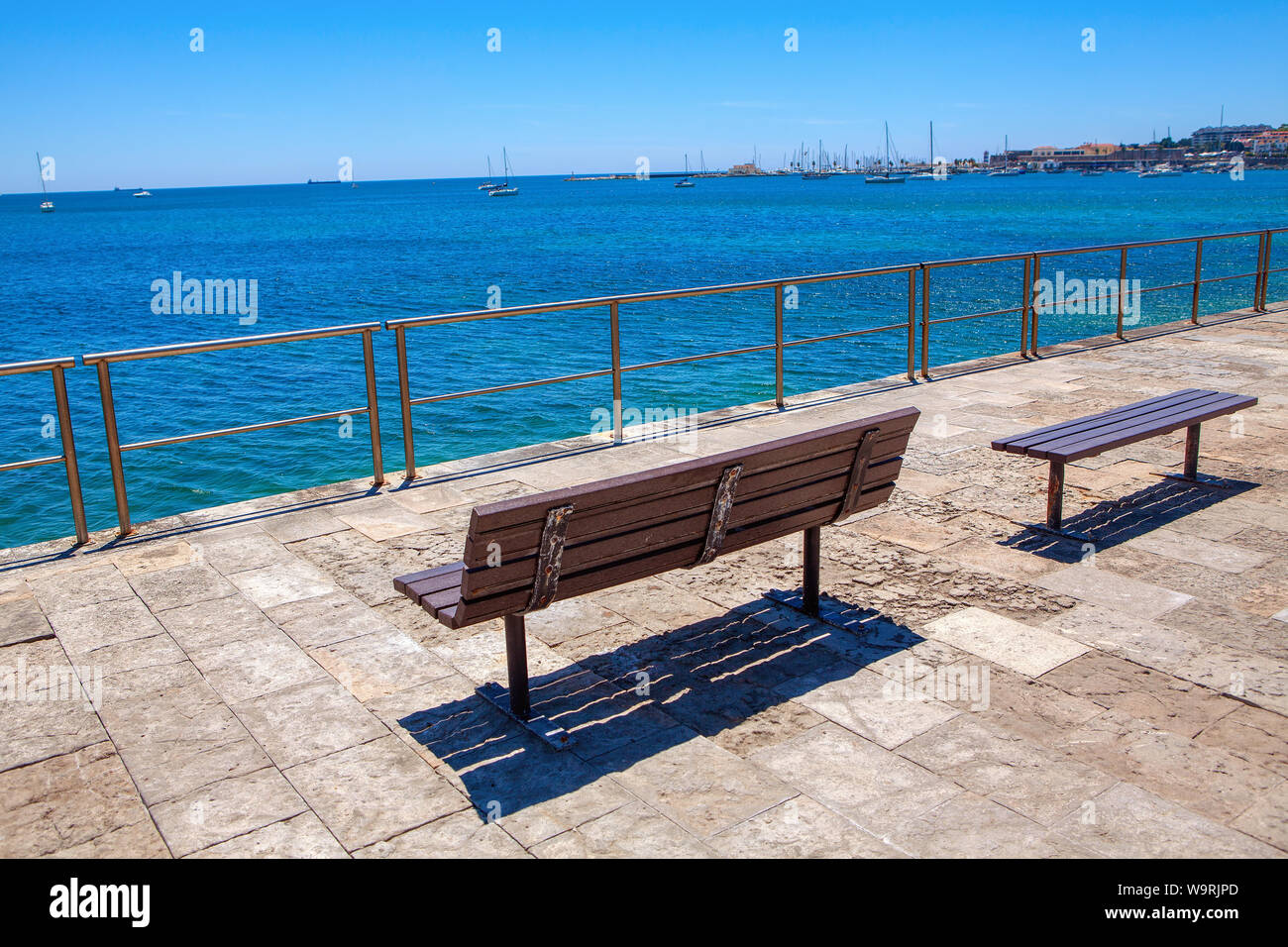 bench on the shore near Atlantic Ocean Stock Photo - Alamy