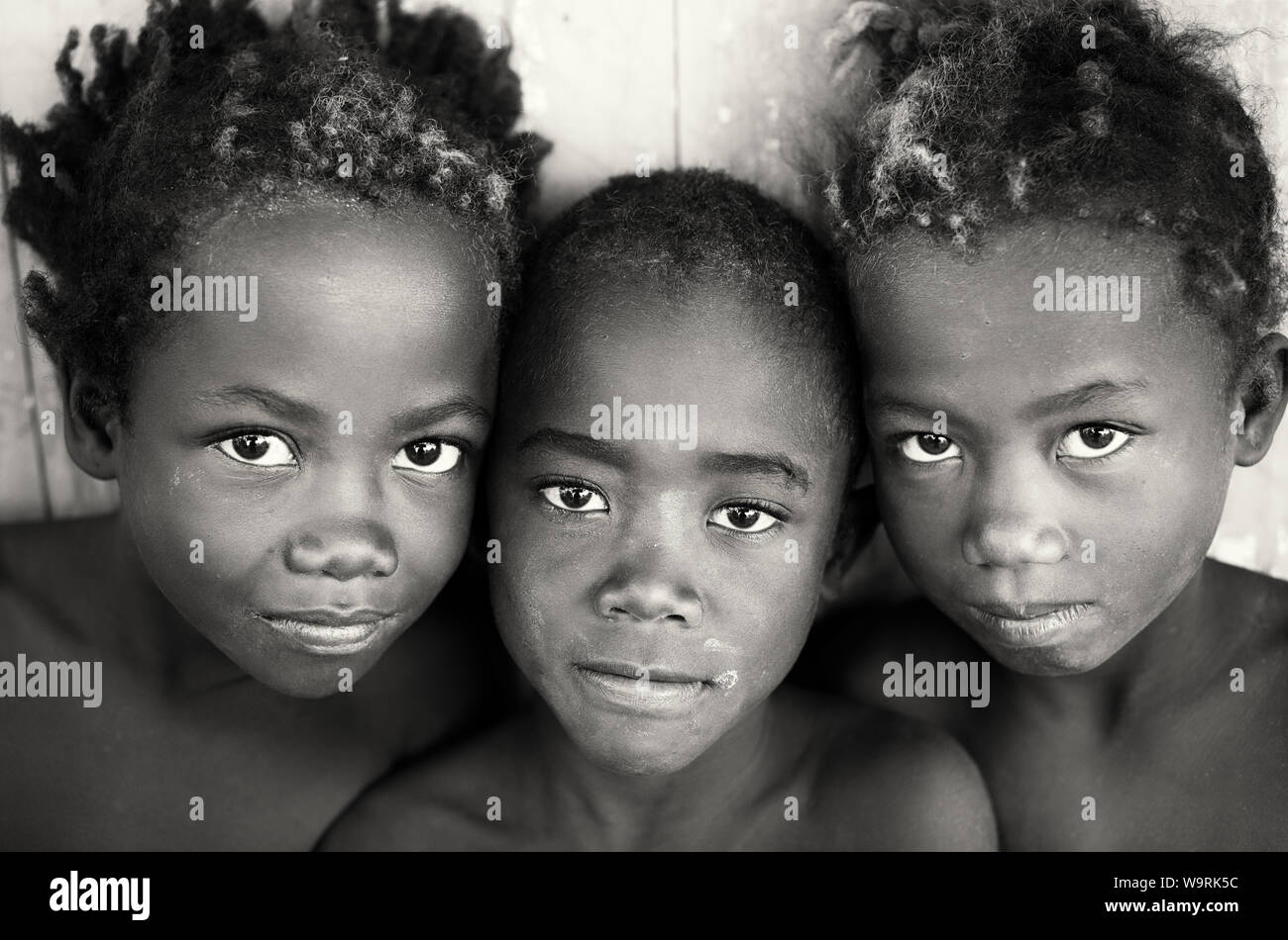Young children in Morondava, Madagascar. Due to an ongoing political ...