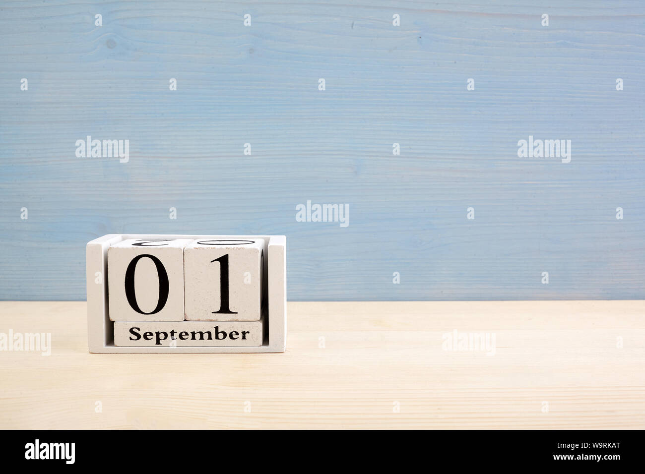 .September 1st white wooden calendar on wood background. Copyspace for ...