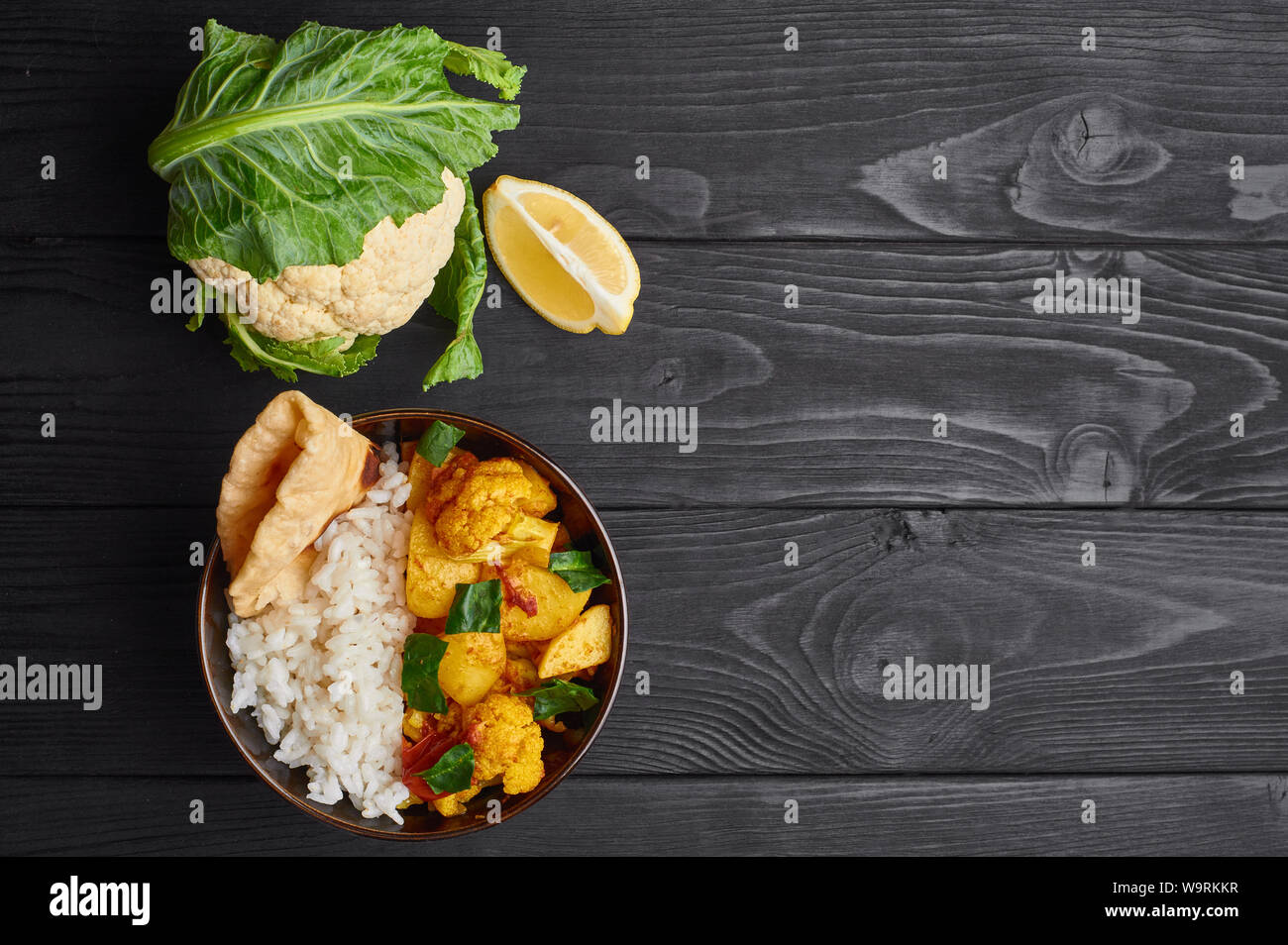 aloo gobi with rice and chapati. Indian cuisine vegetarian curry cooked ...