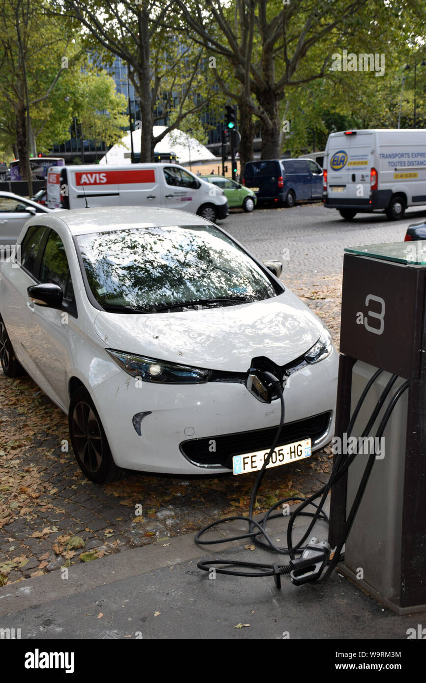 Electric car recharging, Paris, France Stock Photo - Alamy