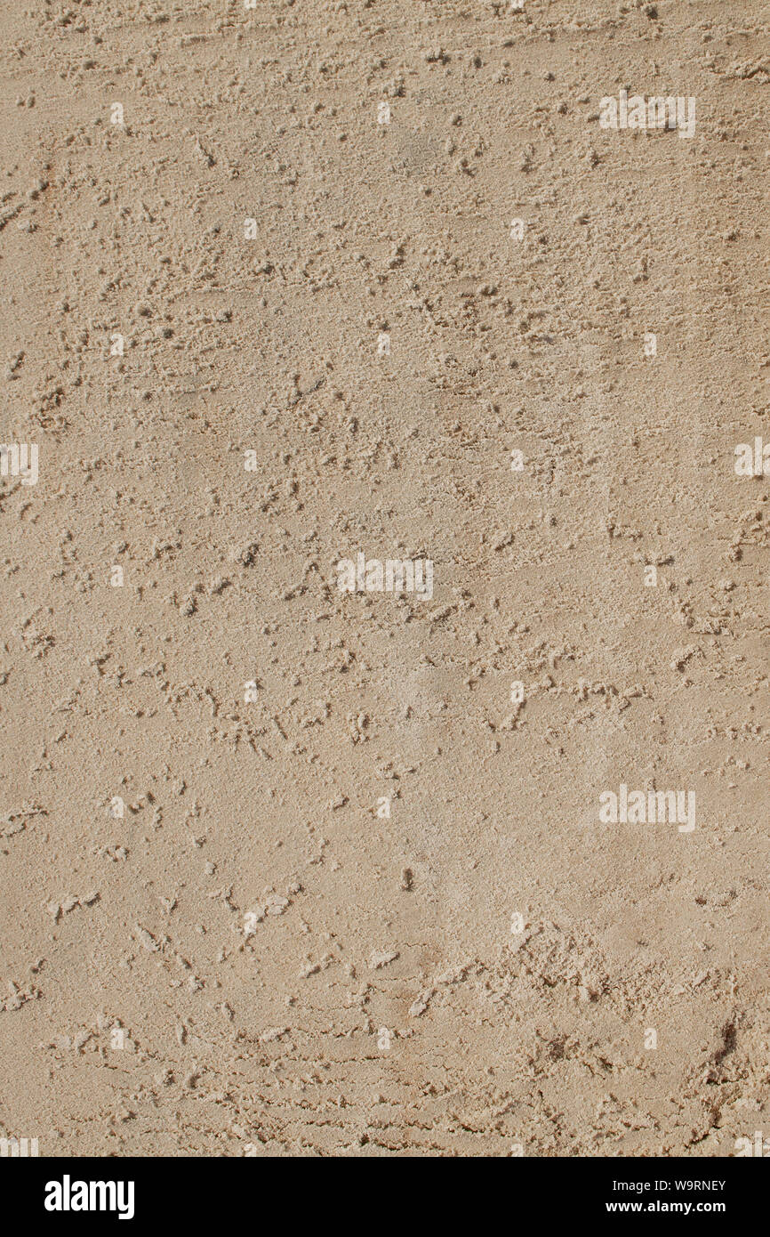 Wet sand texture in the sea shore beach - retro, vintage style look ...