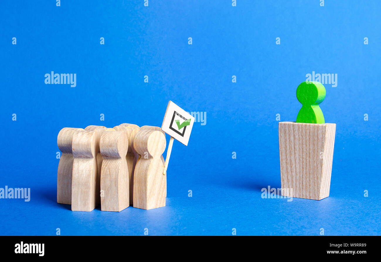 A crowd of people support a candidate for political elections. The ...