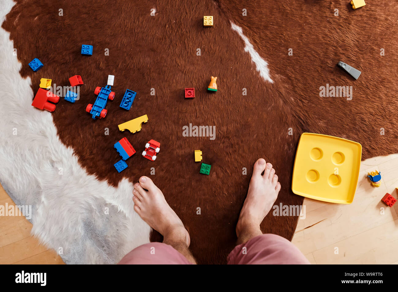 Mess from construction of toy building blocks in the floor Stock Photo ...