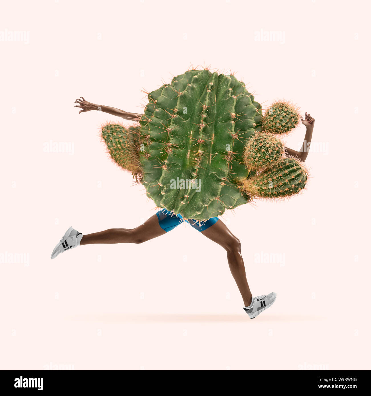 Nature's forces. Running or jogging female body as a green cactus on ...