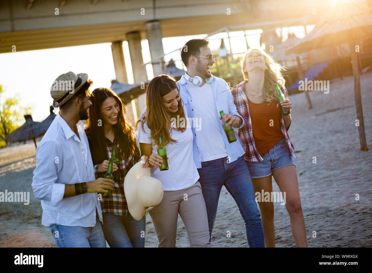 Happy friends laughing and smiling outdoors Stock Photo - Alamy