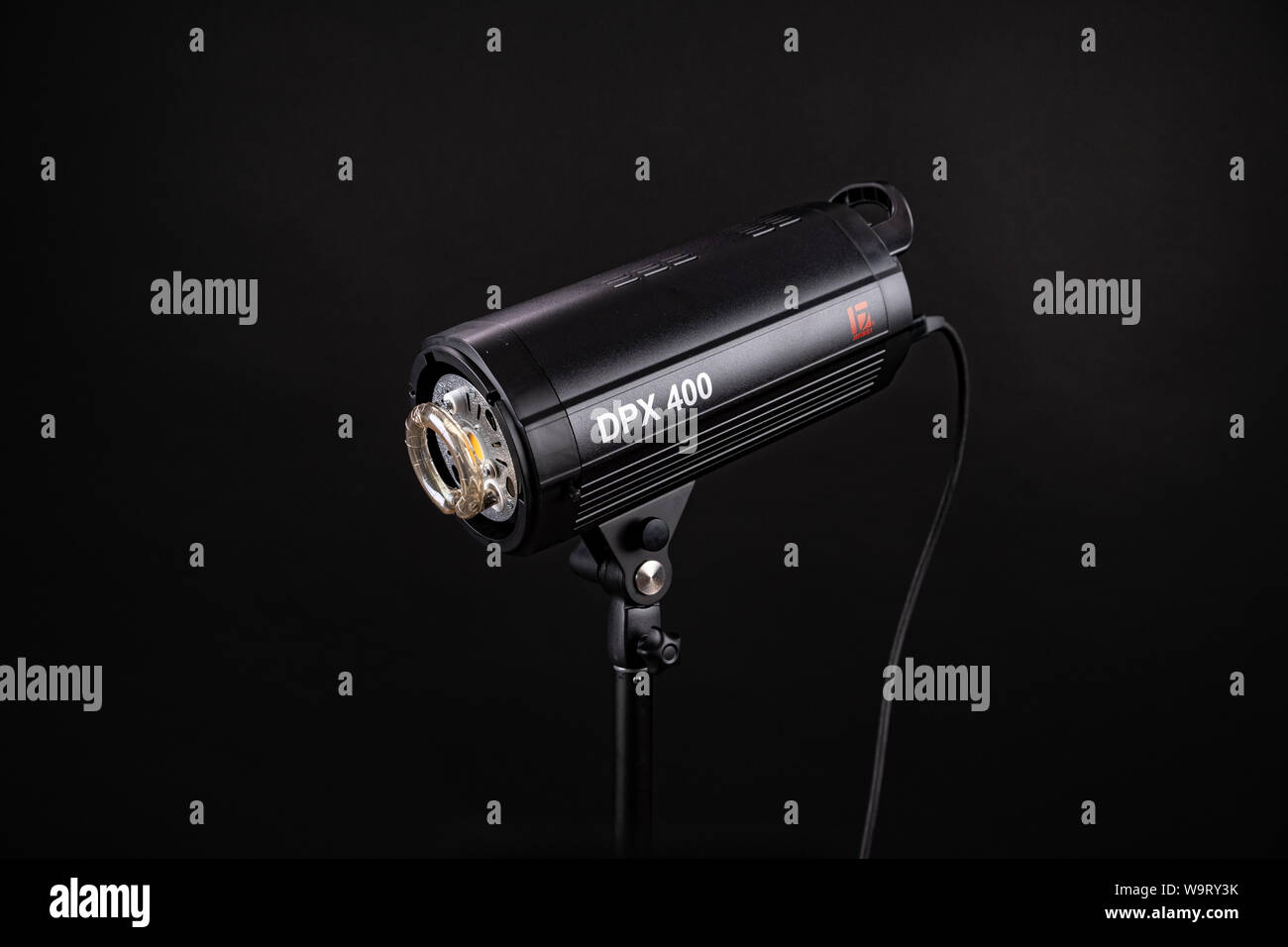 Photo studio strobe light flash bulb. Close up view of professional ...