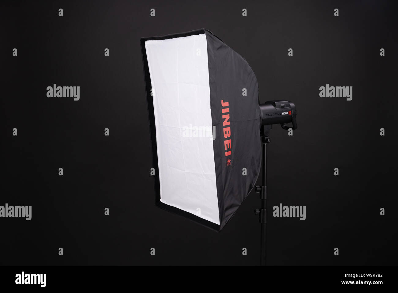 professional softbox over black background. A dark black studio softbox ...