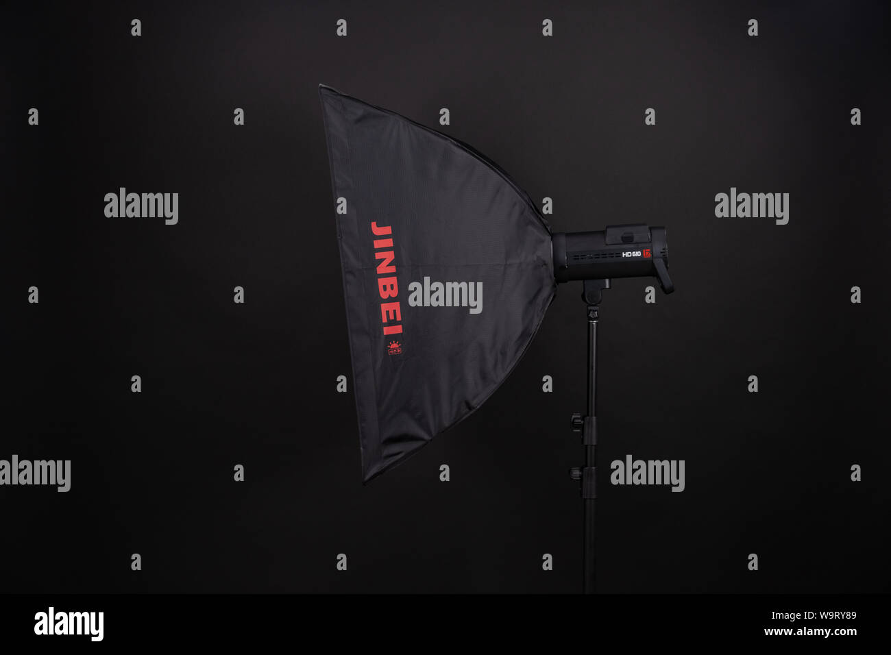 professional softbox over black background. A dark black studio softbox ...